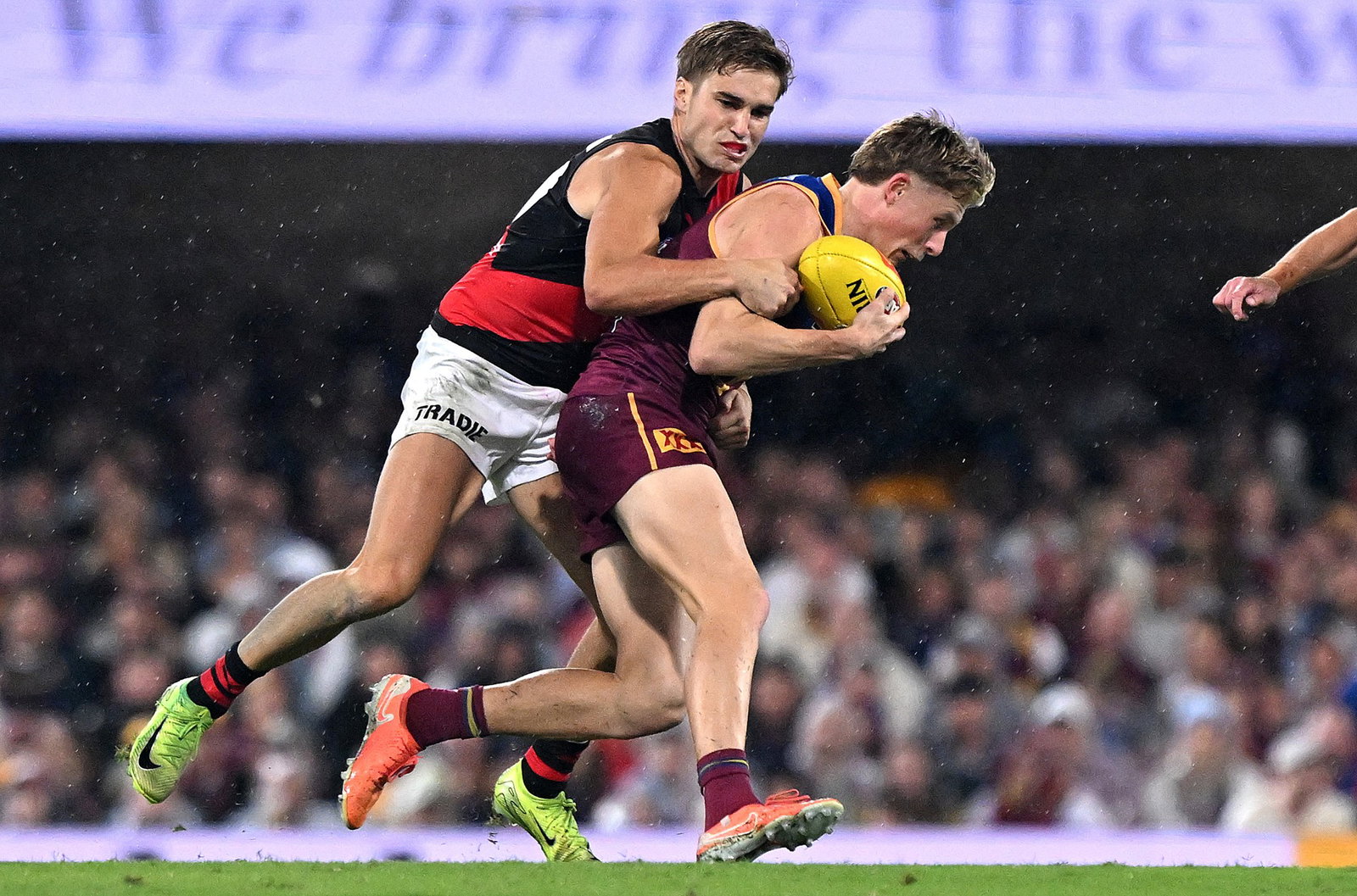 Brisbane holds off Essendon comeback to win by 18 as young Bombers gun ...