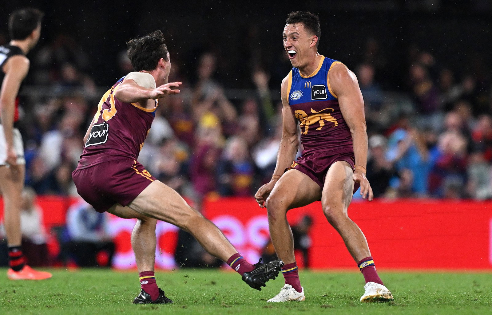 Brisbane holds off Essendon comeback to win by 18 as young Bombers gun ...