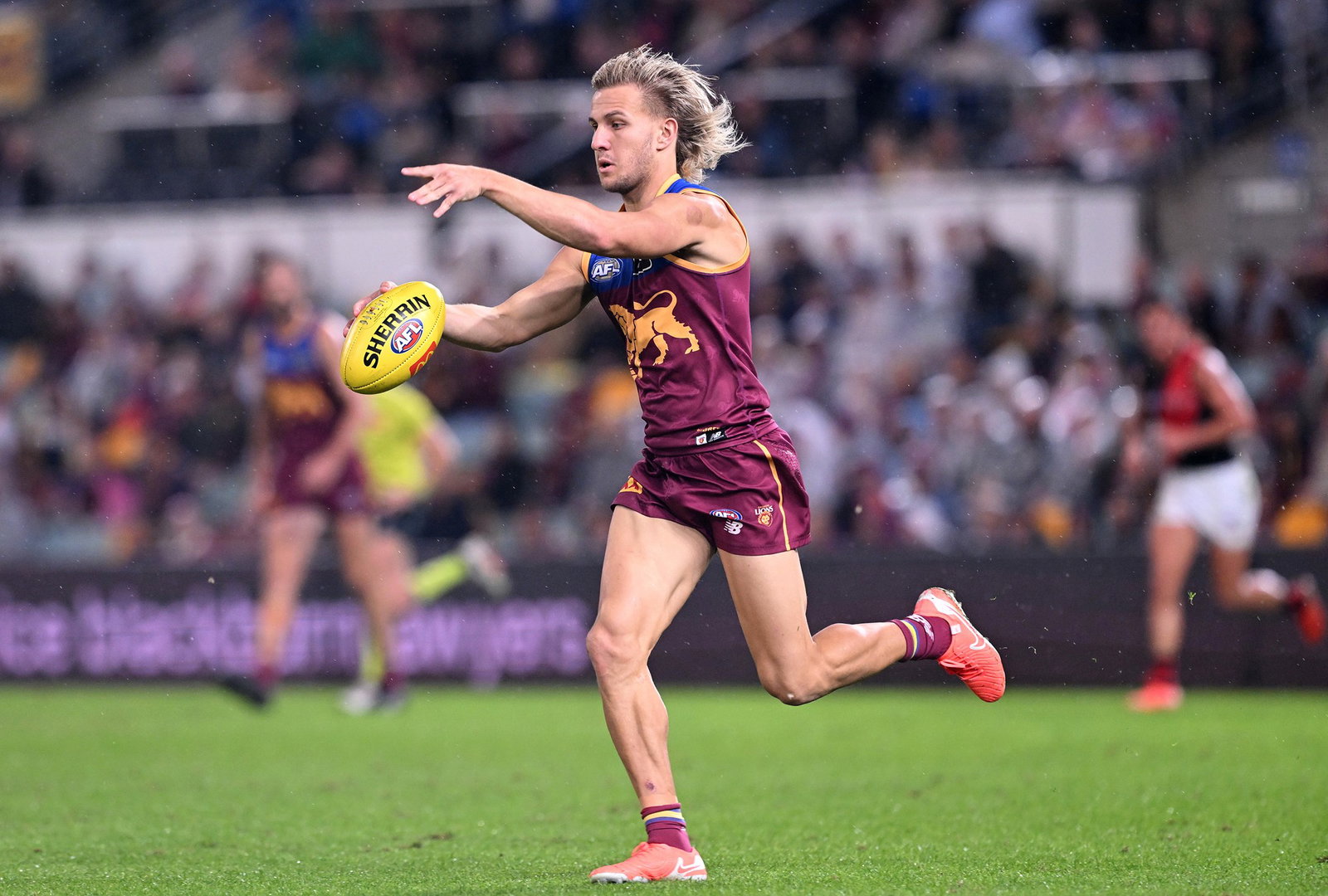 Brisbane holds off Essendon comeback to win by 18 as young Bombers gun ...