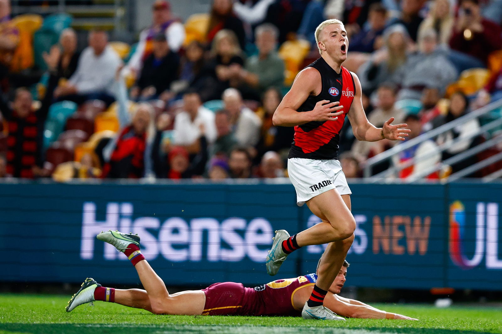 Brisbane holds off Essendon comeback to win by 18 as young Bombers gun ...